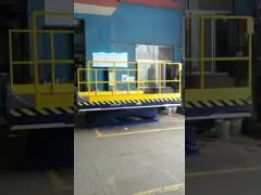 La carga hidráulica Scissor al nivelador de muelle de la elevación con el botón de la emergencia y las válvulas de seguridad