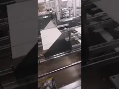 プレゼント包装用自動機械