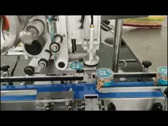 Round bottle label applicator