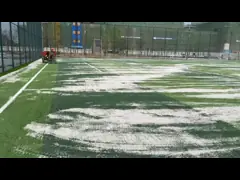 fill the sand to the soccer artificial grass.MP4