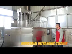 Ultrasonic cleaner with lifting system