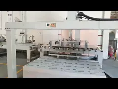 Automatic film covering and cutting machine