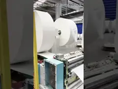 High speed napkin machine with automatic transfer