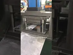 How is the aluminum oil cooler fin made on the reciprocating fin stamping machine ?