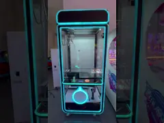 Juegos operados con monedas Máquina de juegos de regalo Equipo de entretenimiento en interiores Mini Plush Toy Claw Crane Machine