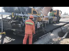 Siming Technology's non-contact ultrasonic balance beam is paired with a VOLVO asphalt paver for op