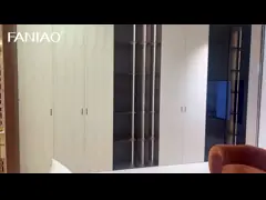 This is a tall cabinet for the living room, which combines wooden doors and glass doors.