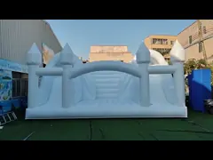 white bounce house with 2 slides