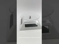 China 360 Degree Rotating Led Light Solar Display Stand For Displaying Mobile Phones Jewelry Watch for sale