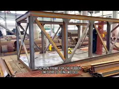 The rubber lined pipe iron frame for export is being welded