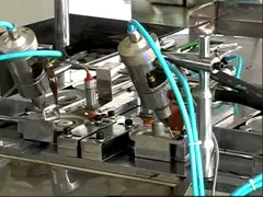 China 4 Station Oil Filter Caps PVC Gluing Machine 380V 50Hz 1500 Pieces/Hour Capacity for sale