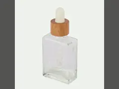 China Round Cosmetic Dropper Bottle Bamboo Glass Dropper Bottle 15ml 20ml 30ml 50ml 100ml for sale