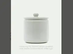 China Airtight Household White Creative Stoneware Kitchen Coffee Sugar Flour Round Ceramic Canister With Lid for sale