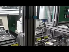 Chaîne d‘assemblage entièrement automatisée pour composants industriels avec boutons