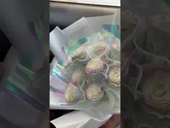 China Wholesale waterproof rainbow film, transparent glass paper, flower paper, laser paper, flower bouquet packaging paper materials for sale