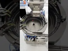 Watch the Vibratory Bowl Feeder Feeding Small Plastic Parts