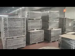 Hot dip galvanized round posts are being packaged