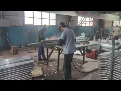 The mesh connection accessories are being welded on the fence post