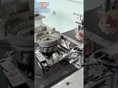Watch the Vibratory Bowl Feeder Feeding Metal Parts