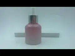 China 2025 Recyclable Pink Glass Bottle for Oil Dropper Bottles with Silver Collar Luxury Wholesale 30ml for sale