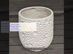 China Pebble  Shaped Protrusion Pattern White Clean Cylindrical Shape Fiber Clay Planter for sale