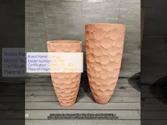 warm earthy terracotta tone round fiber clay planter with rounded tiles arranged lightweight durable low-maintainence flower pot holiday Villa office decoration Rooftop Gardens landscaping project