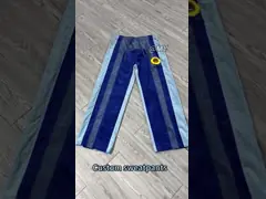 China Loose Fit Men's Sweatpants With Custom Embroidery Patch And Color Blocked Corduroy Fabric for sale