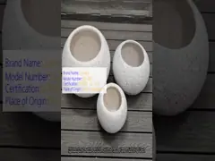 neutral beige natural speckled stone -mimic design round fiber clay planter earthy aesthetic lightweight durable low-maintainence flower pot holiday Villa office decoration garden landscaping project