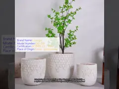 neutral beige round fiber clay planter with natural honeycomb pattern lightweight durable low-maintainence flower pot holiday Villa hotel shopping mall office decoration garden landscaping project