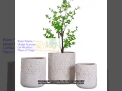 neutral beige round fiber clay planter with honeycomb design pattern lightweight durable low-maintainence flower pot holiday Villa hotel shopping mall office decoration garden landscaping project