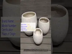 neutral beige natural speckled stone -mimic design round fiber clay planter lightweight durable low-maintainence flower pot holiday Villa office decoration garden landscaping project