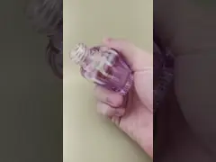 Nice Design Clear Purple Glass Bottle for Essence