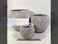 GRC pot grey round fiber cement planter with a monstera leaf design pattern lightweight durable low-maintainence flower pot holiday Villa office decoration Rooftop Gardens landscaping project