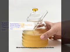 China Wholesale White Empty Honey Jar Ceramic Honey Pot with wooden dipper for honey storage for sale