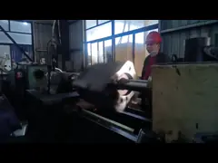 Hydraulic breaker front cylinder assembly