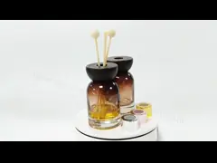 China Brown Round Glass Aromatherapy Bottle 120ml with 5.7cm Diameter for Essential Oils and Fragrance Dispensing for sale