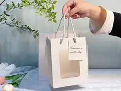 China Window Gift Bag Transparent Window Handbag Creative Gift Paper Bag Bouquet Packaging Handbag for sale