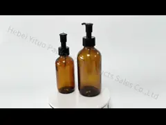 China Refillable Shampoo Bottles Press Pump Empty Glass Shampoo Containers for sale
