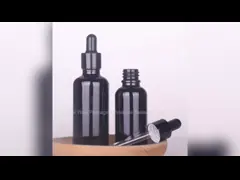 China Black Aromatherapy Oil Bottle 15ml 20ml 30ml Glass Dropper with UV Protection for sale