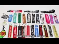 China Customized Key Tag Woven Flight Label Custom Jet Tag Fabric Woven Brand Embroidered Keychain Promotional Gifts for sale