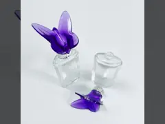 China Custom Butterfly Glass Perfume Bottles 5ml-100ml Capacity with Zinc Alloy Caps for Home Decoration for sale