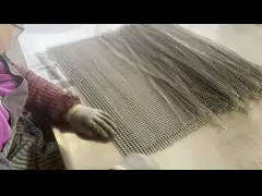 A step in the manufacturing process of a wire mesh conveyor belt