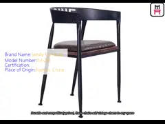 China Loft Leather And Metal Dining Chairs , Industrial Black Metal Dining Chairs With Arms for sale
