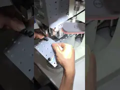 Button fixing machine