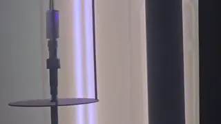 Magnetic control sputtering coating machine for coating colored glass bottles