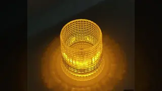 Rotating Whiskey Glass Glows Night Light