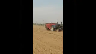 Cross winch fertilizer spreader