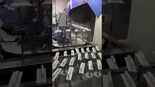 Vacuum coating of plastic products by uv line