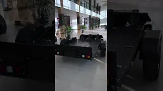 China Lift Type Motorcycle Trailer 4300mm x 2250mm with Hydraulic System and Hot Dip Galvanized Black Finish for sale