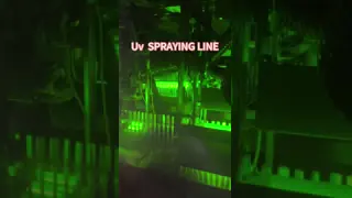 The Uv assembly line sprays the ignition machine shell in gold color